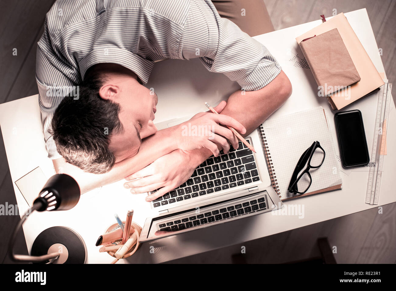 Top view of a nice tired man sleeping Stock Photo - Alamy