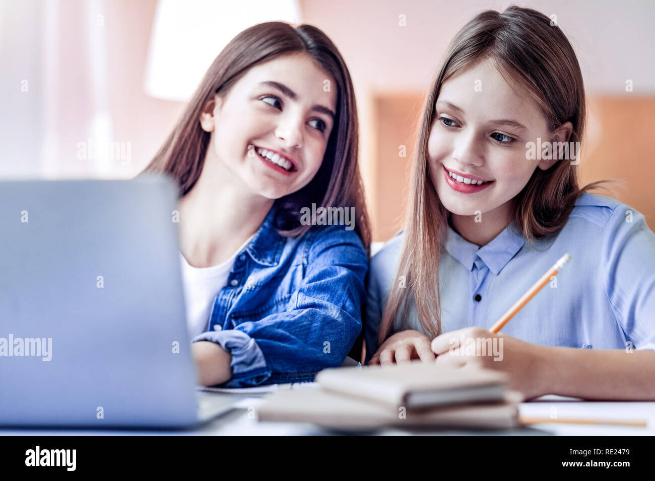 Two girls study talk hi-res stock photography and images - Alamy