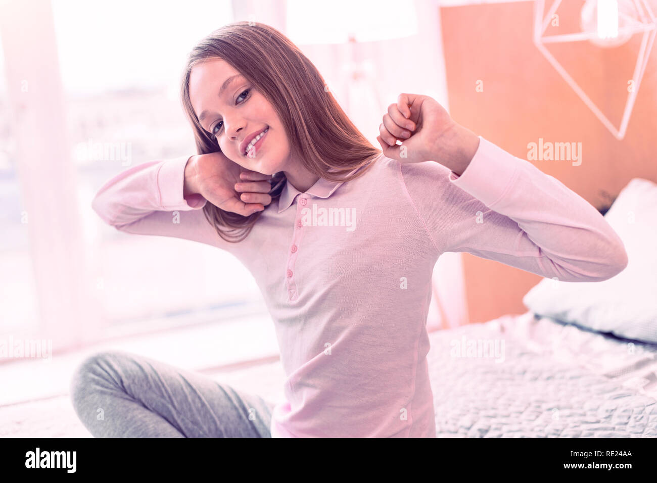 Beautiful girl waking up in the morning Stock Photo - Alamy