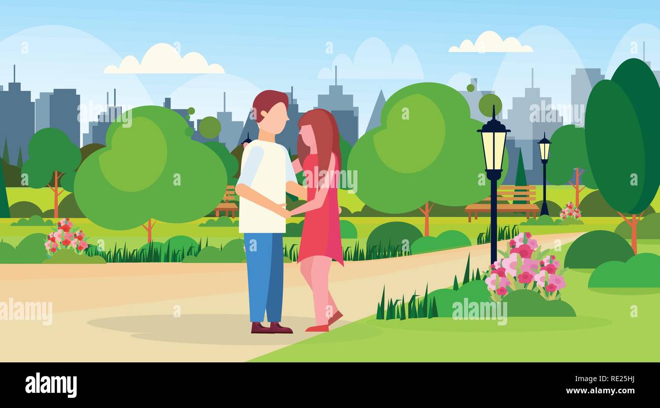 man woman embracing walking together city public park happy valentines ...