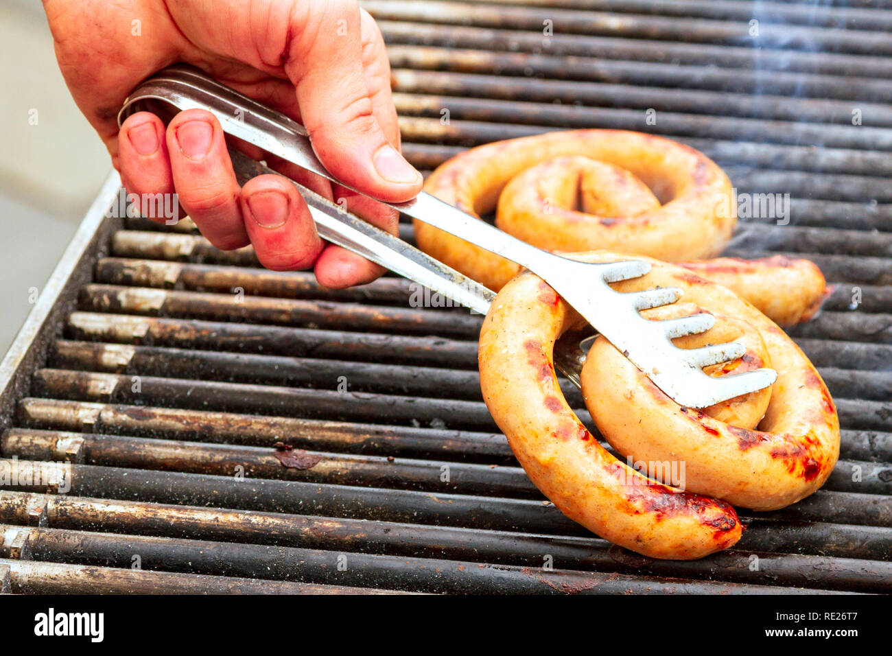 Black man cooking on a barbecue hi-res stock photography and images - Alamy