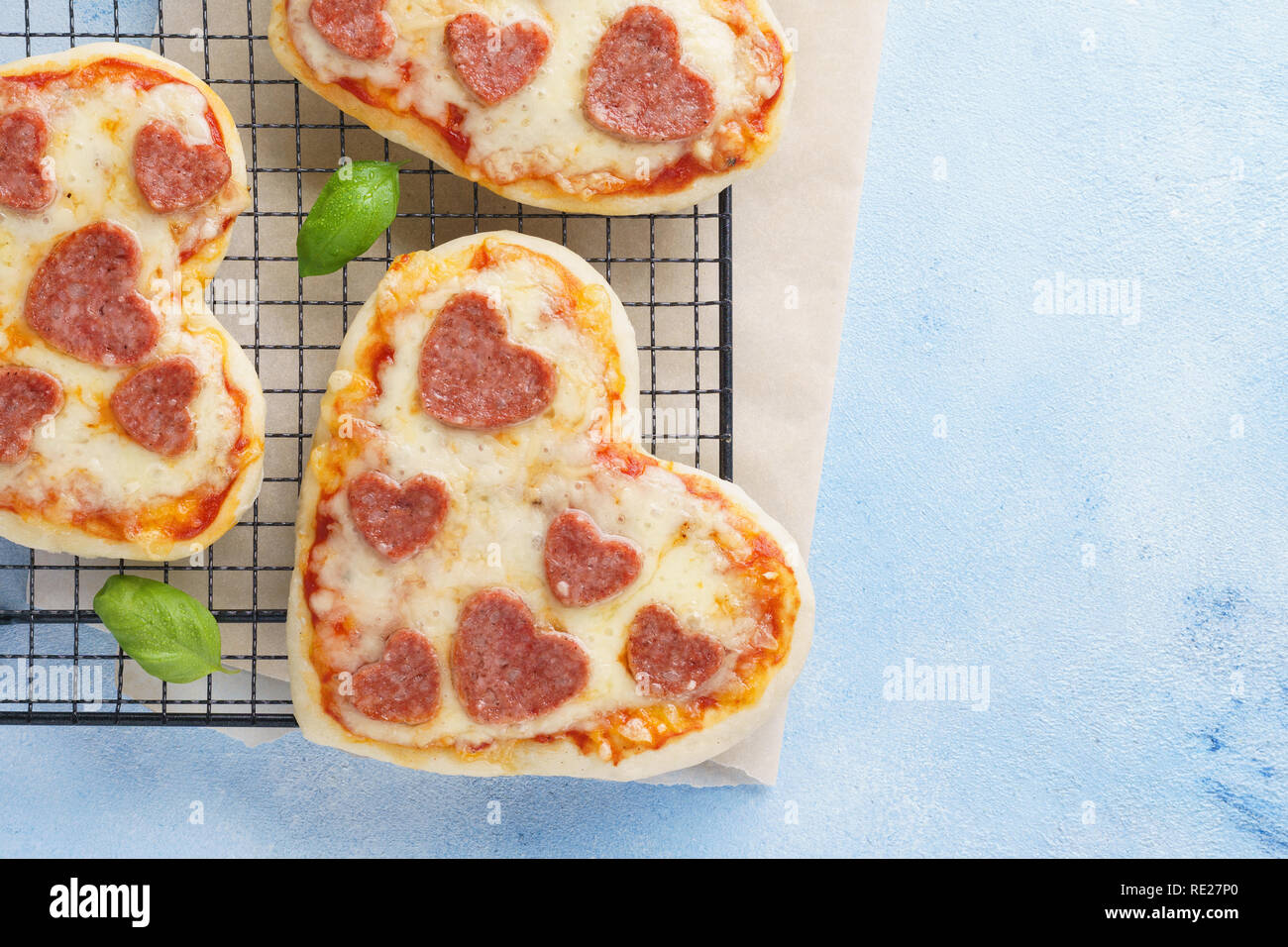 Heart shaped mini pizza. Valentine's day romantic menu mockup for ...