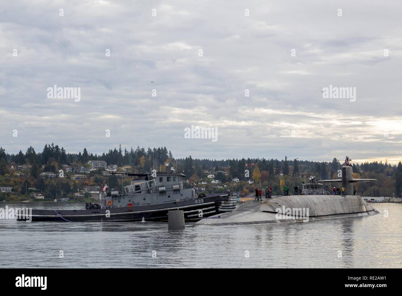 The Ohio-class guided-missile submarine USS Michigan (SSGN 727) departs ...