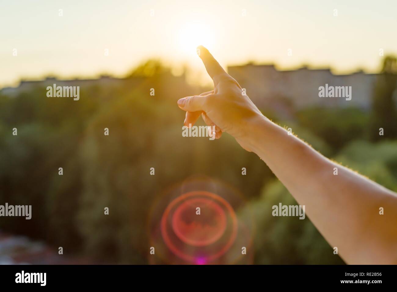 Silhouette woman pointing finger sky hi-res stock photography and ...