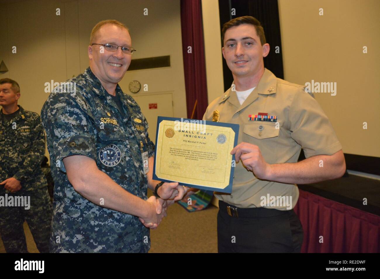 BREMERTON, Wash. (Nov. 9, 2016) – Capt. Alan Schrader (left), Naval ...