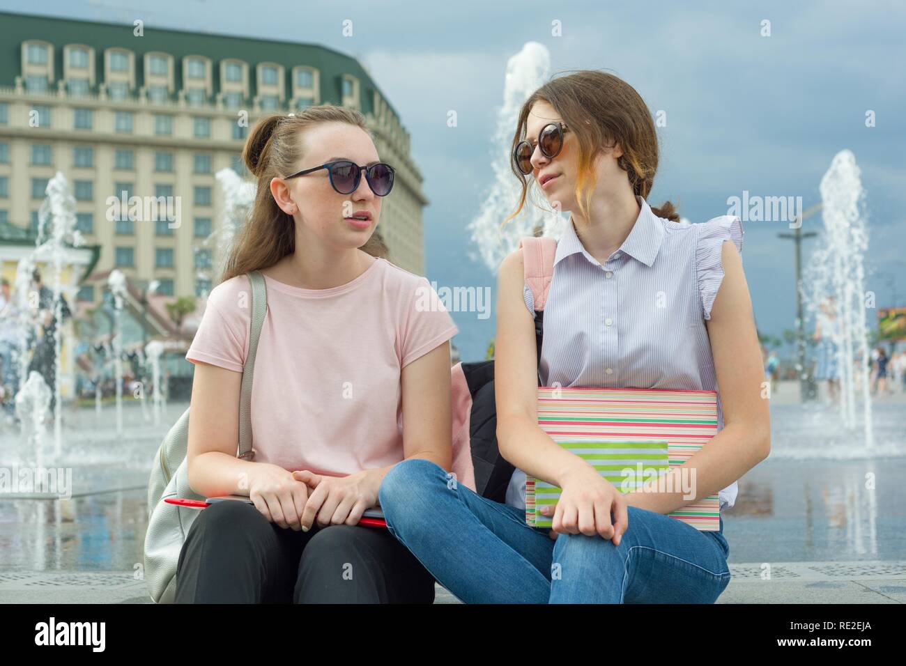 Outside Talking Teenagers Sitting High Resolution Stock Photography and ...