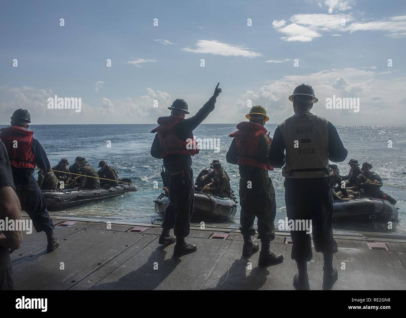 SOUTH SULU SEA (Nov. 12, 2016) Sailors signal to lower the stern gate ...