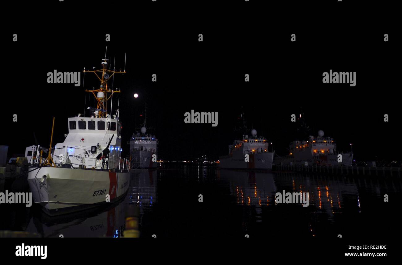 The supermoon shines over Coast Guard Cutters Sea Horse, Legare ...