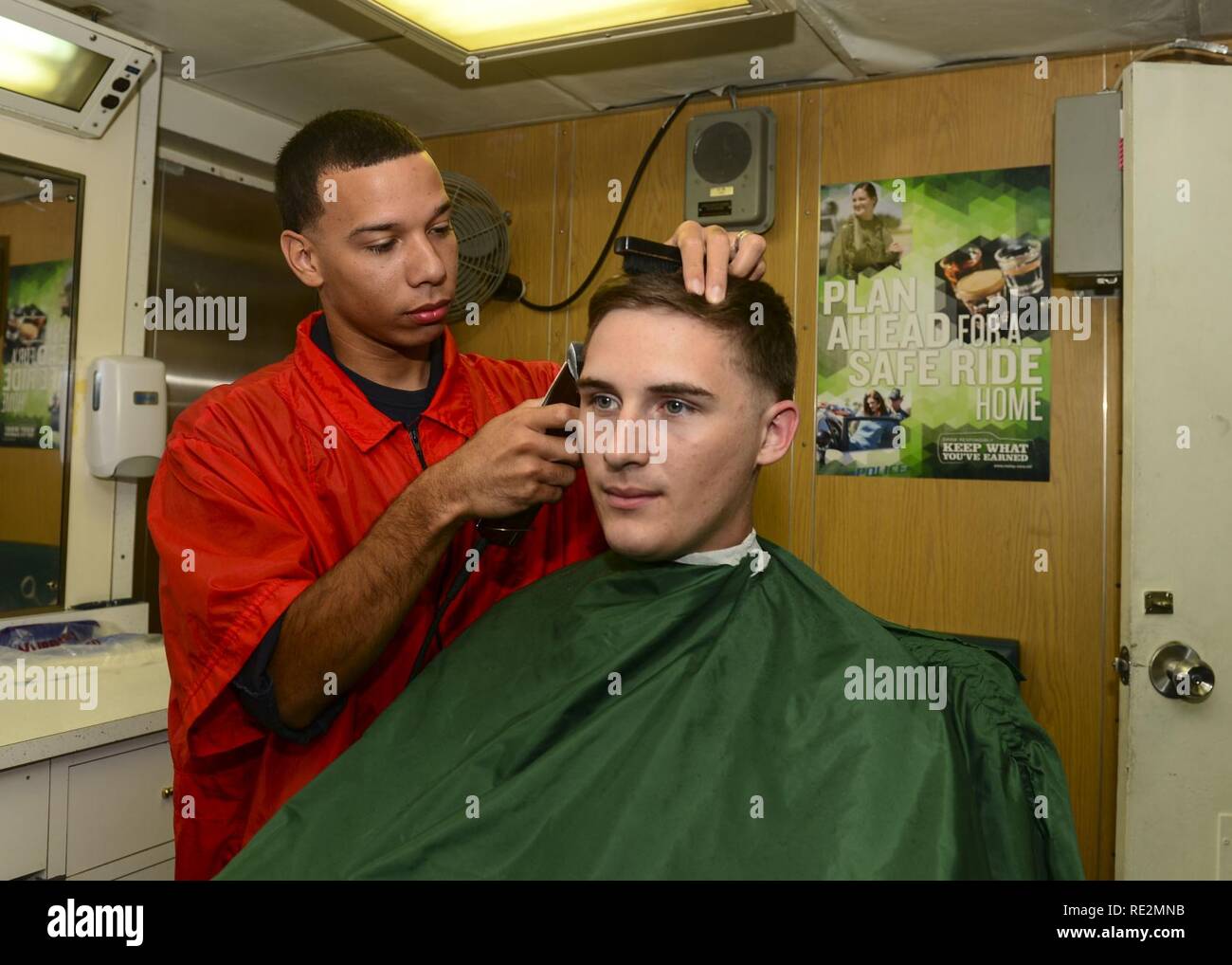 Seaman Augustin Hernandez, left, gives Seaman Spencer Matthews a ...