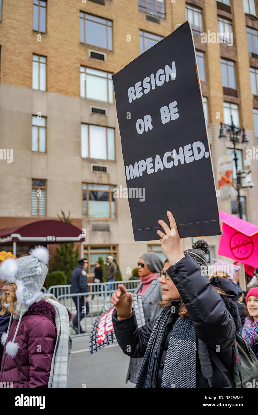 New York, USA. 19th Jan 2019. Women holds a Resign or Be Impeached sign ...