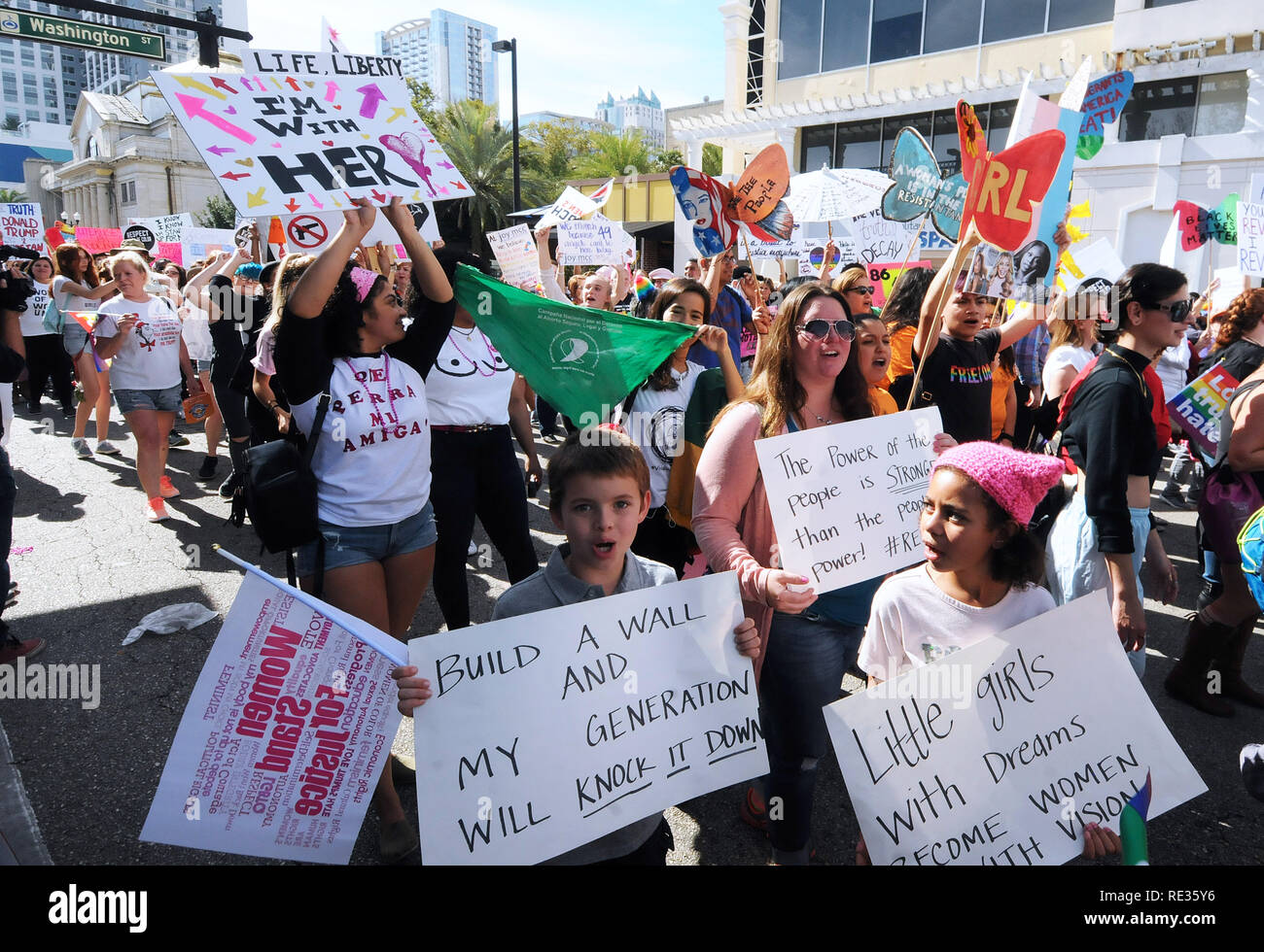 Florida, USA. 19th Jan 2019. Protesters carry signs in the third annual ...