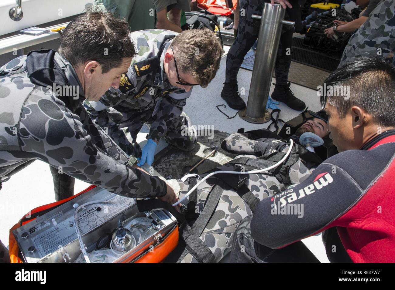 Navy Divers assigned to Mobile Diving Salvage Unit (MDSU) 1 and Royal ...