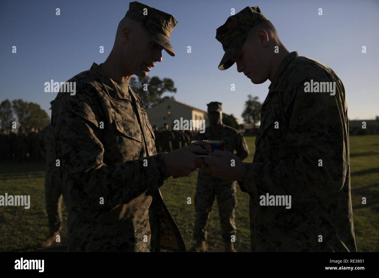 U.S. Marine Corps First Sergeant Frank B. Kammer, left, and PFC Cory C ...