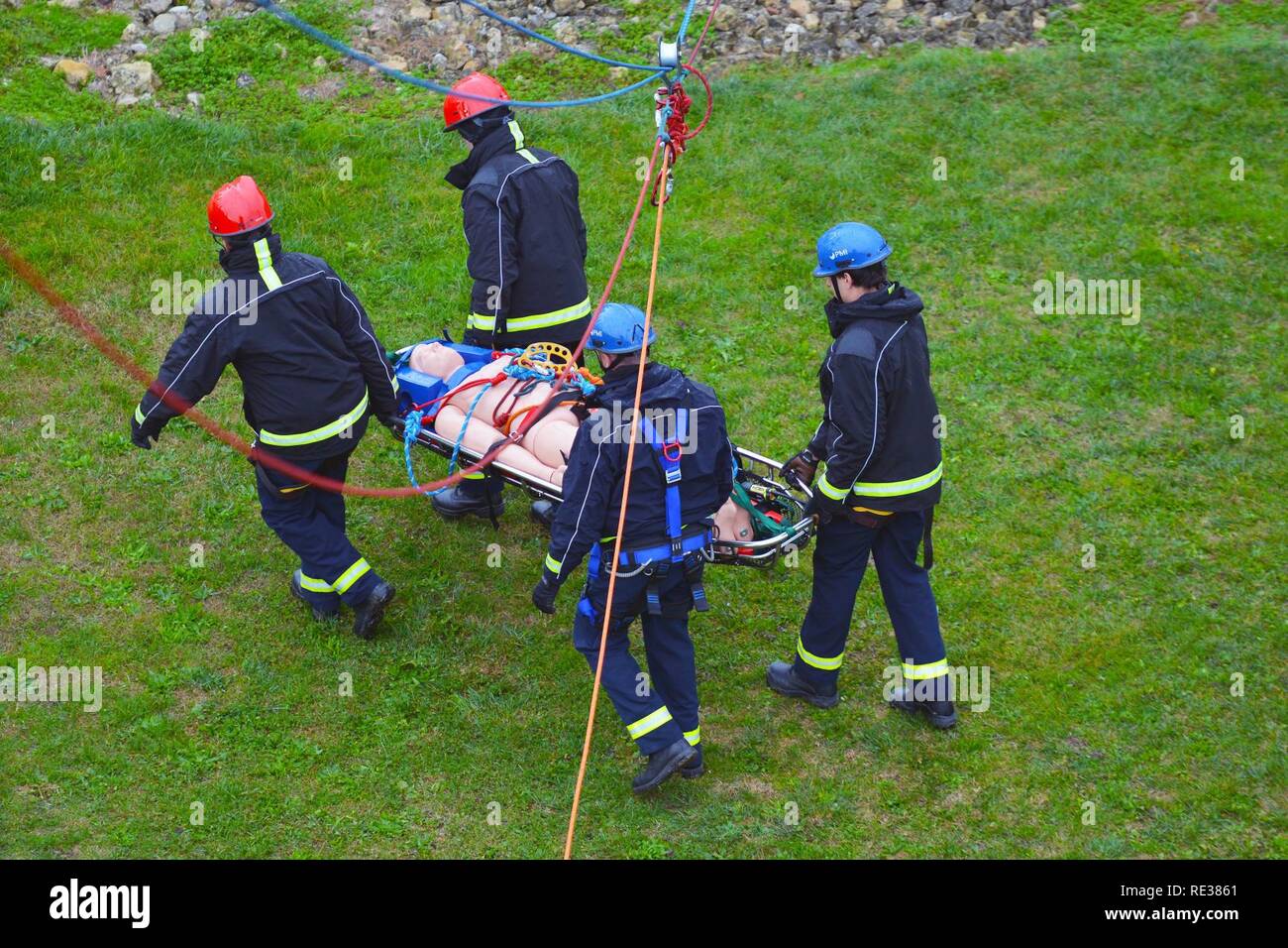 Firefighters assigned to the U.S. Army Garrison Italy, transport a ...
