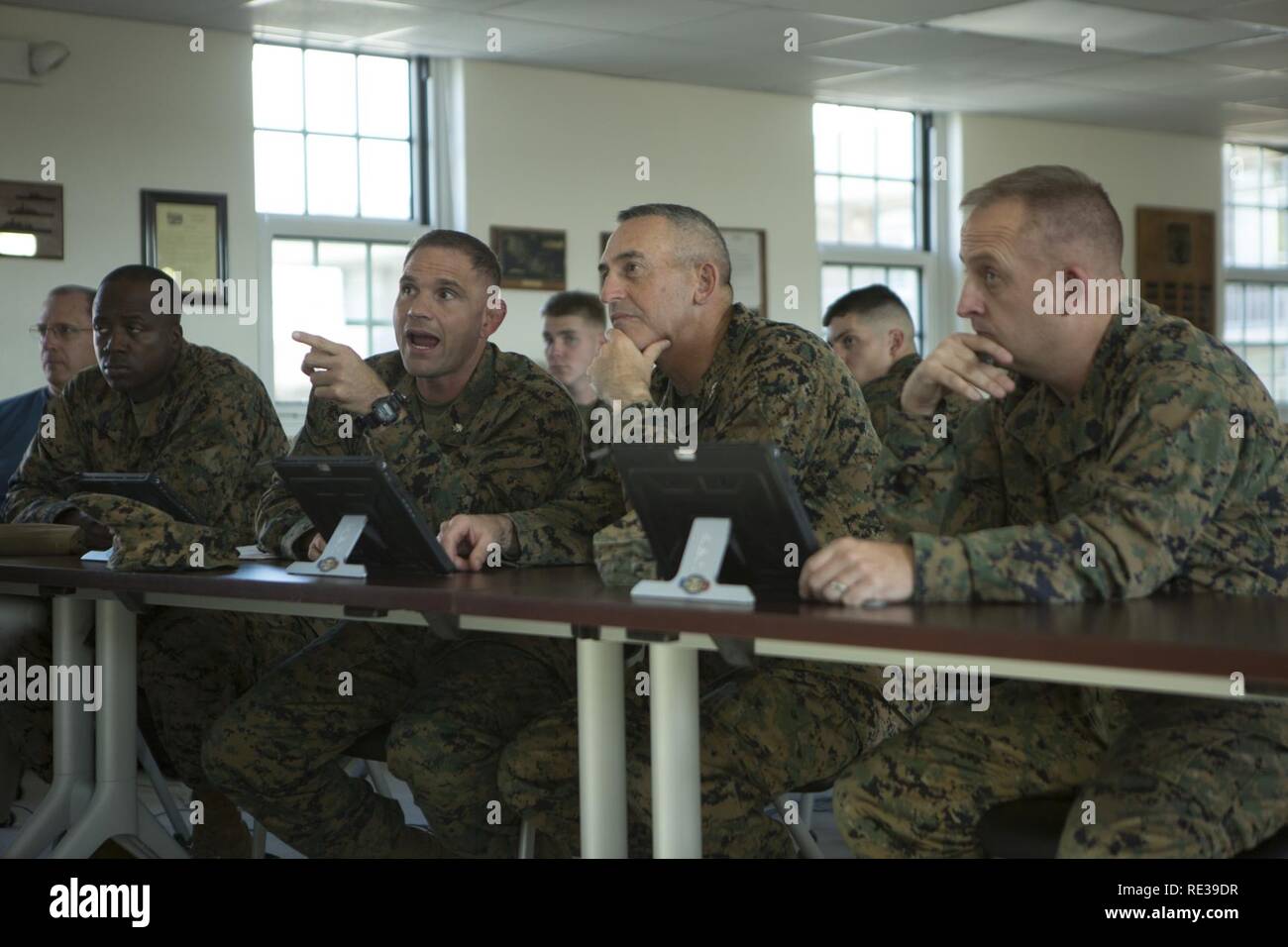 U.S. Marine Corps Lt. Col. Marcus J. Mainz, left, commanding officer ...
