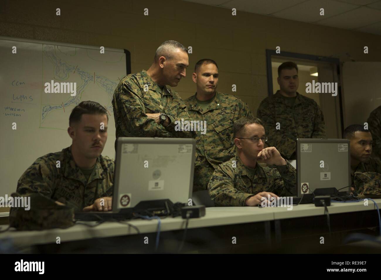 U.S. Marine Corps Maj. Gen. James W. Lukeman, left, commanding general ...