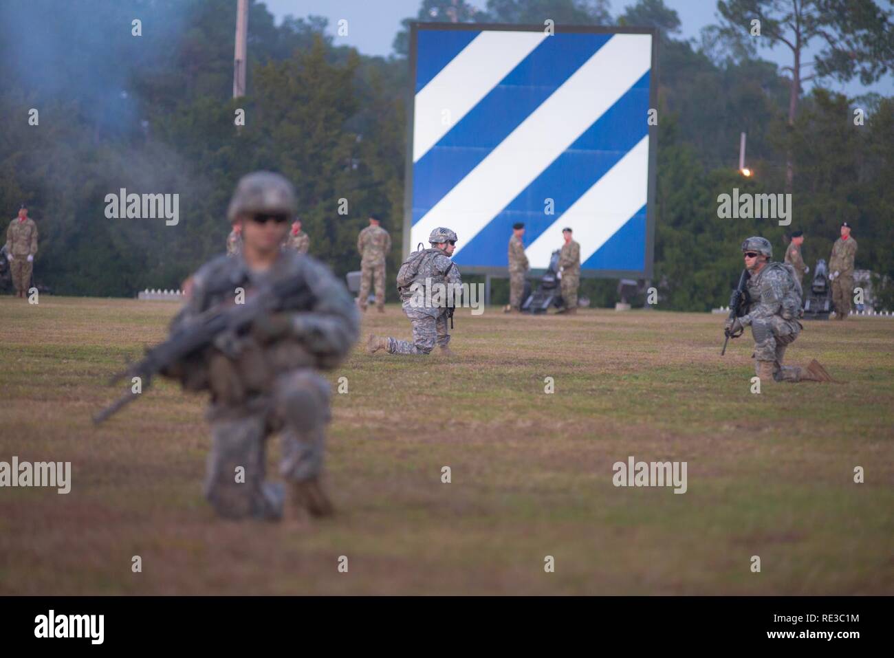 A 3rd Infantry Division infantry squad participates in Twilight Tattoo ...