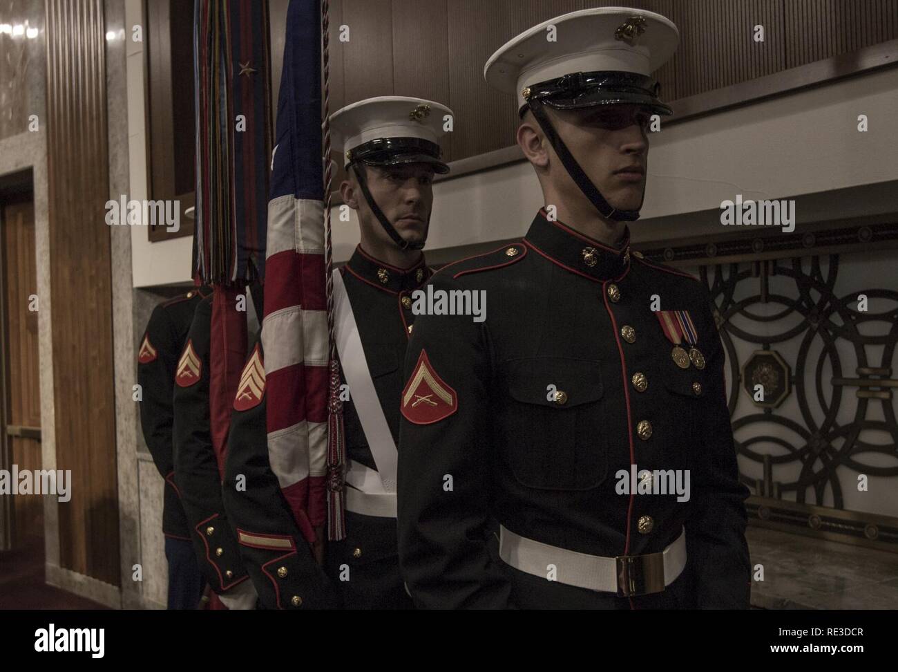 U.S. Marines with Marine Barracks Washington stand at ease before the ...