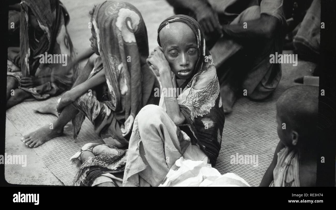 SICK CHILDREN SITTING Stock Photo - Alamy