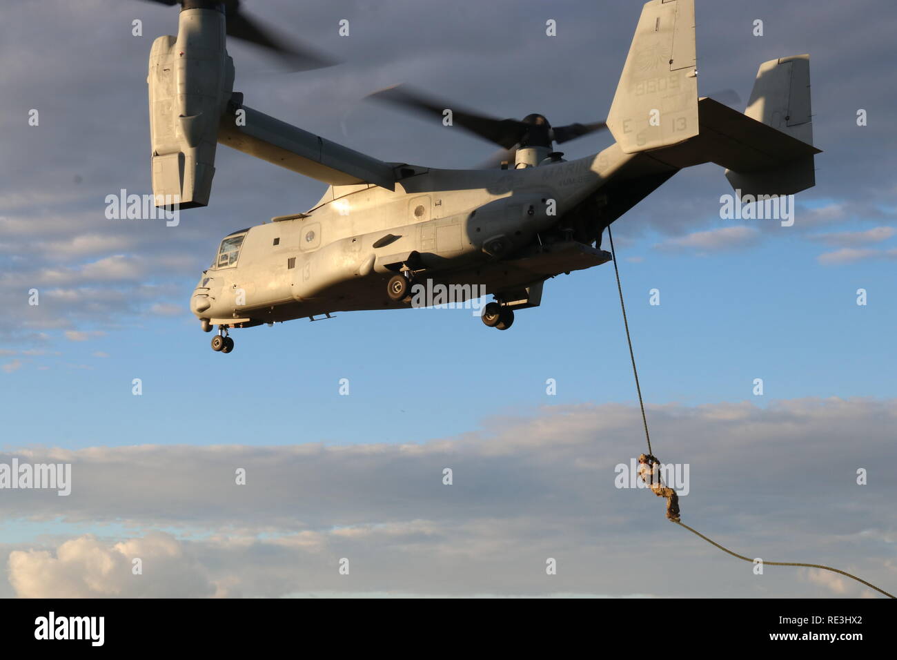 A U.S. Air Force pararescue jumper attached to Special Purpose Marine ...