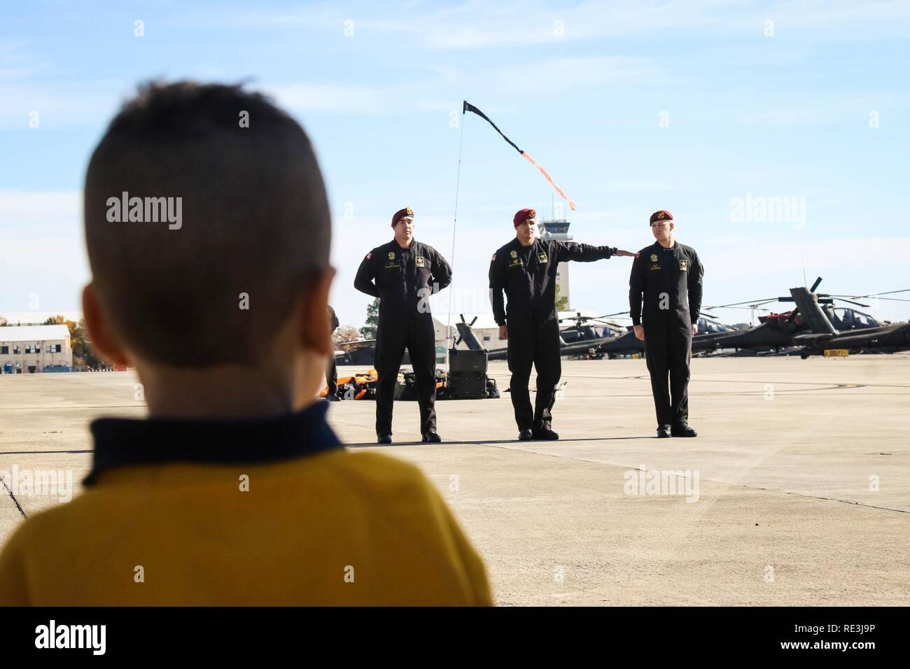 A young boy observes as members of the U.S. Army Golden Knights line up ...