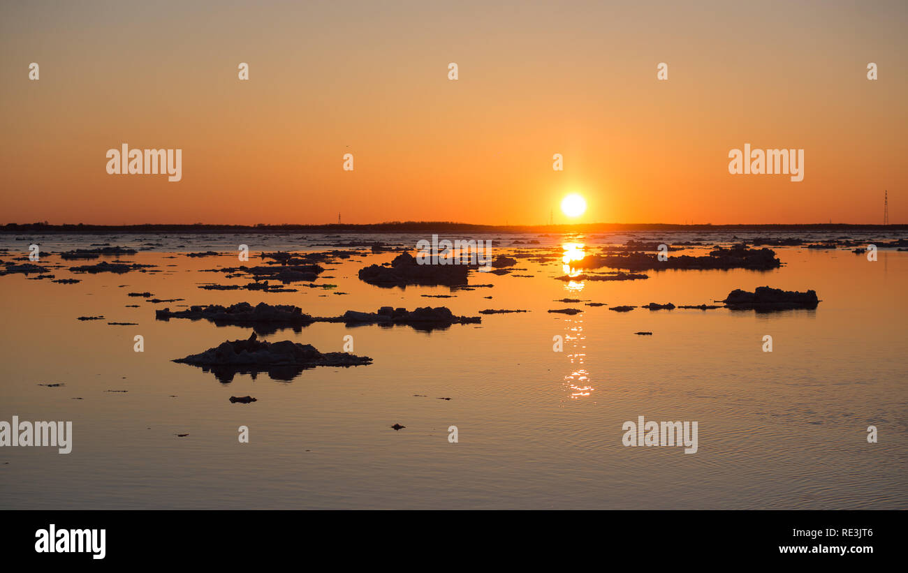 Ice drift on sunset. . Beautiful ice motion evening landscape Stock ...