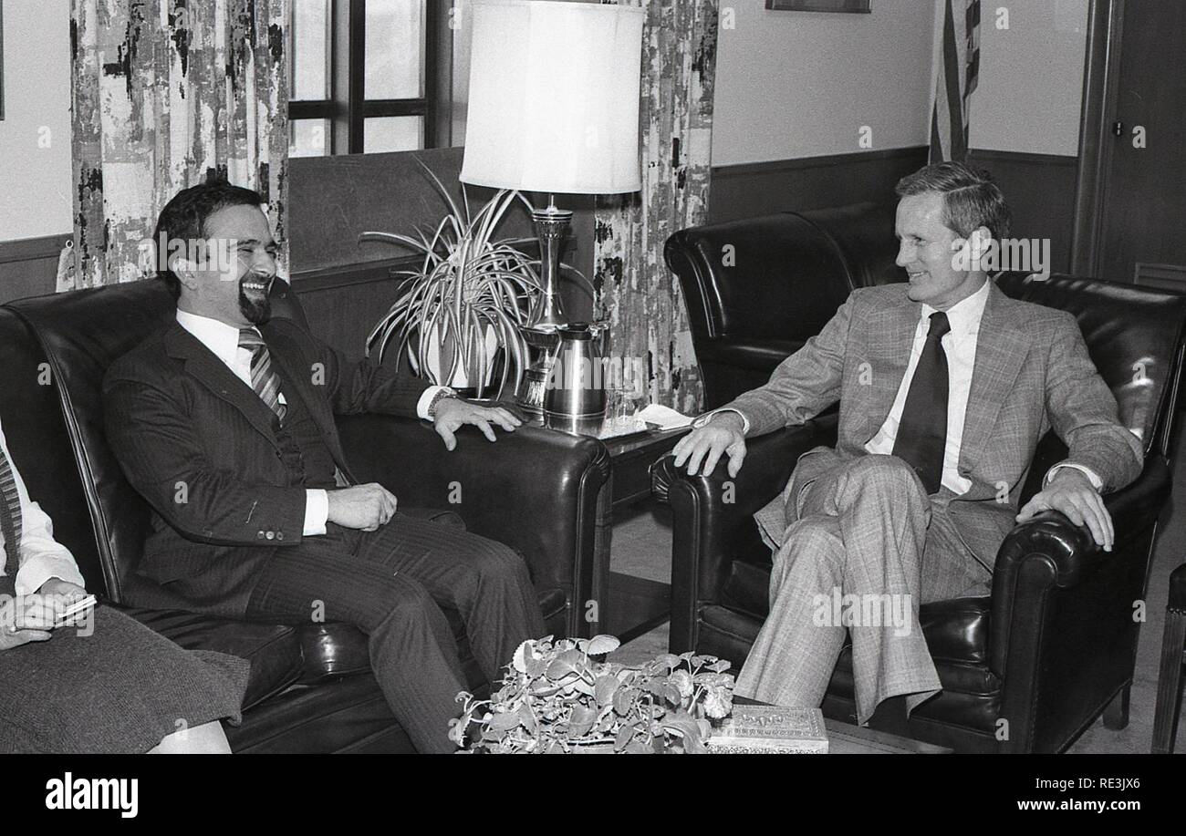 TWO MEN SEATED AND TALKING TO EACH OTHER; CP OF JORDAN W-MOOTER 1-24-78 ...