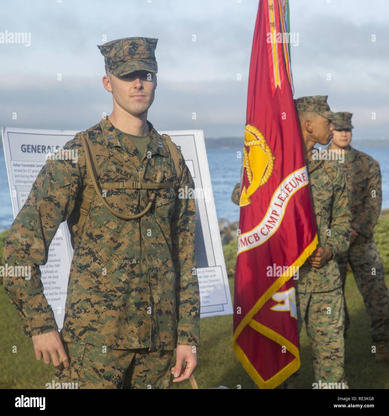 U.S. Marine Corps Capt. Brandon Wilsey, left, bravo company commander ...