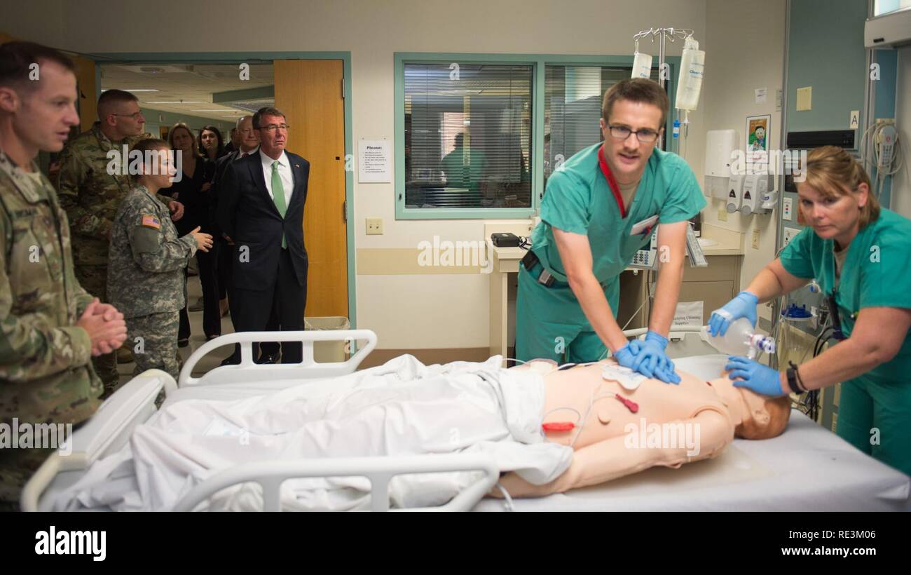 Secretary of Defense Ash Carter observes medical officers using ...