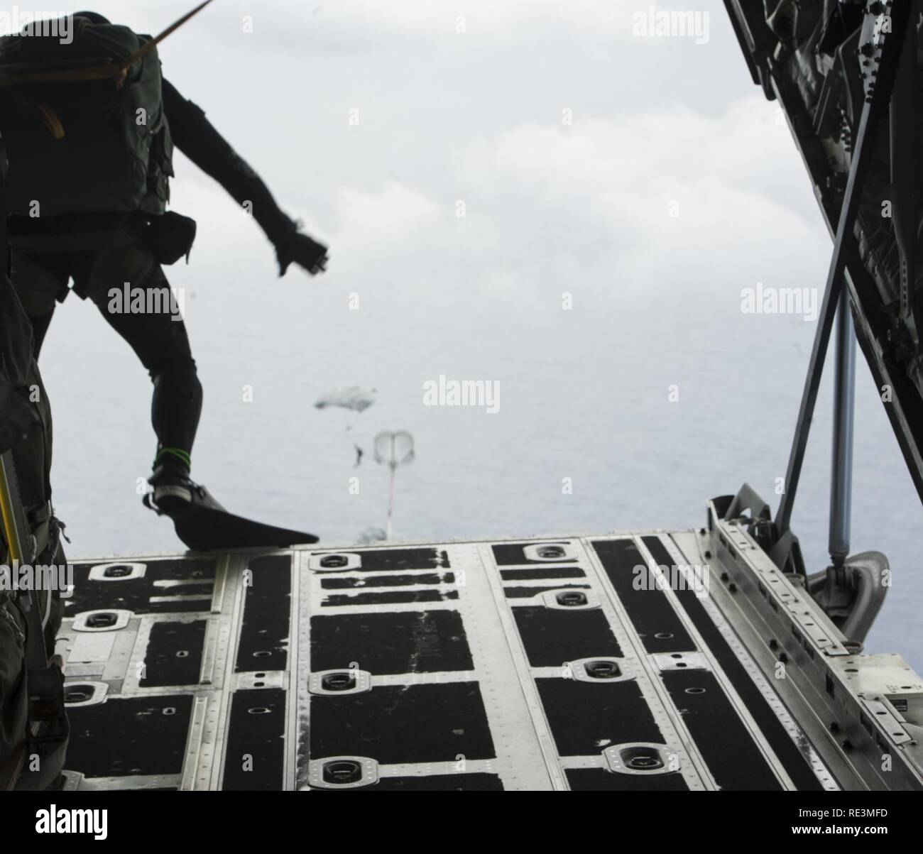 Japan Air Self-Defense Force pararescuemen jump out of an MC-130J ...
