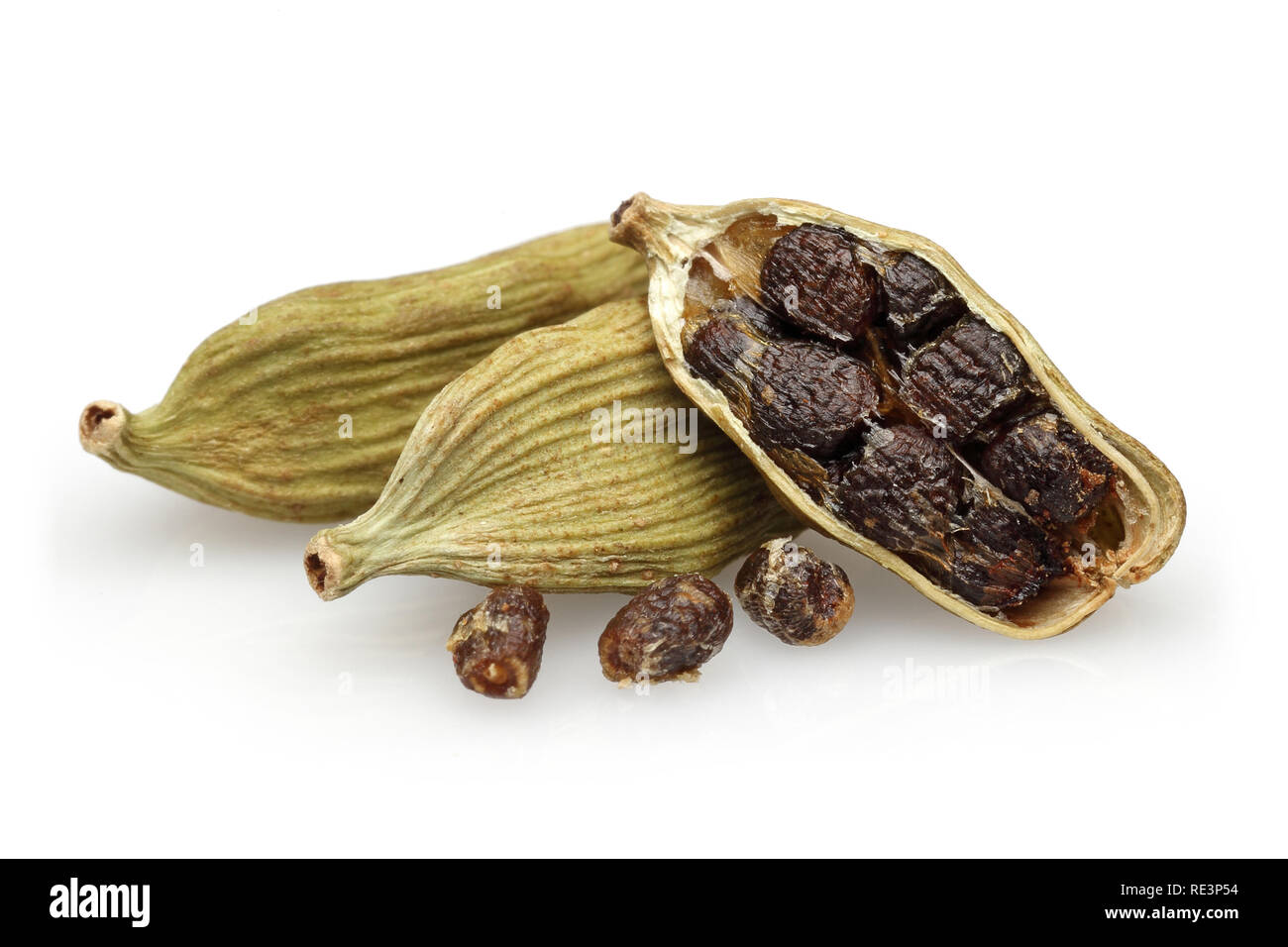 Dry cardamom pods and seeds isolated on white background Stock Photo ...