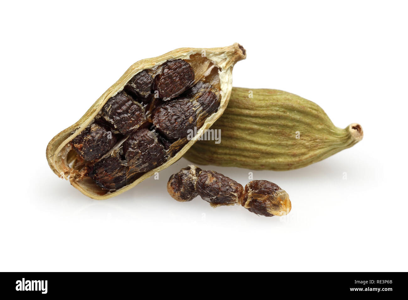 Dry cardamom pods and seeds isolated on white background Stock Photo ...
