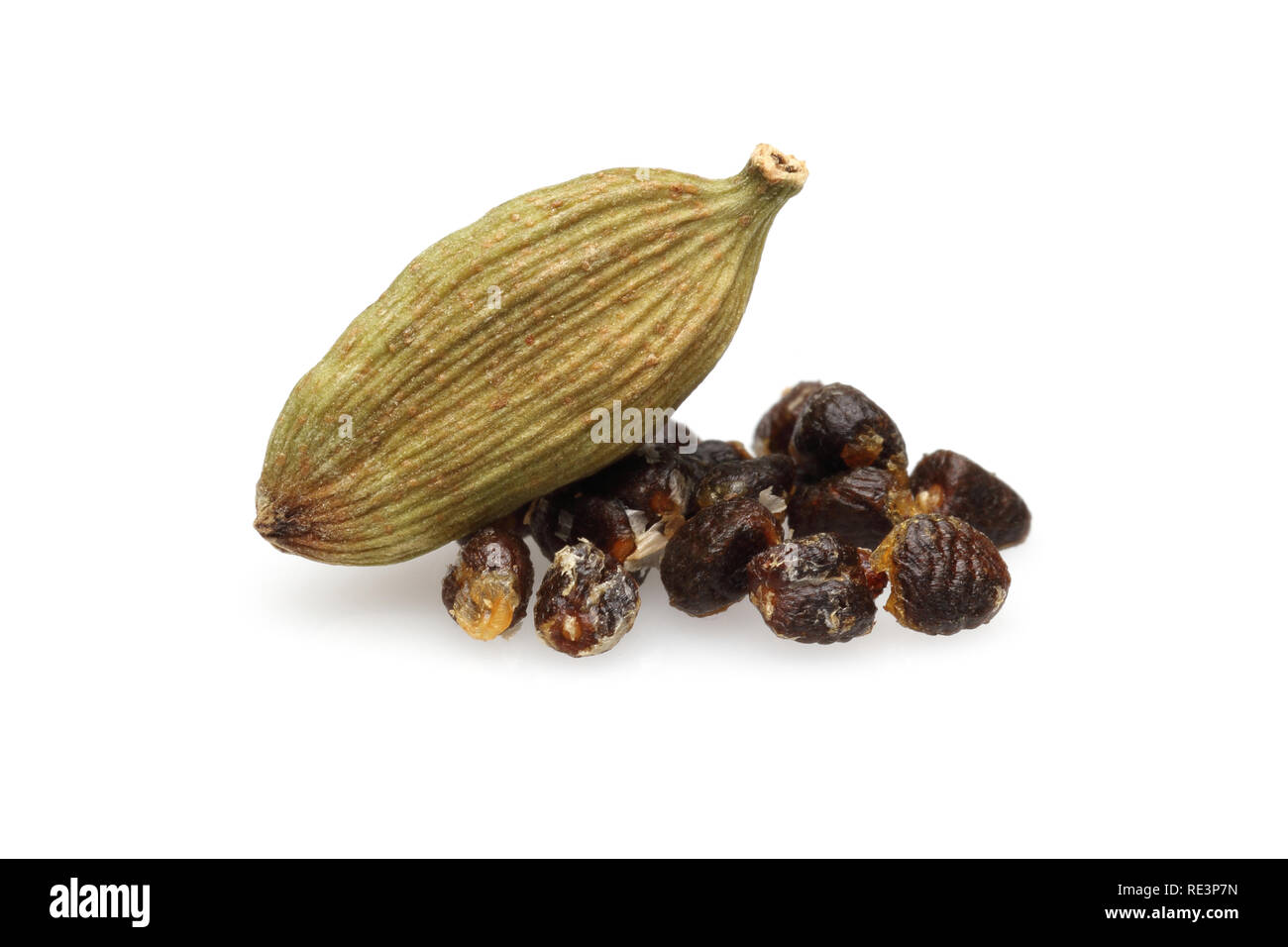 Dry cardamom pod and seeds isolated on white background Stock Photo - Alamy