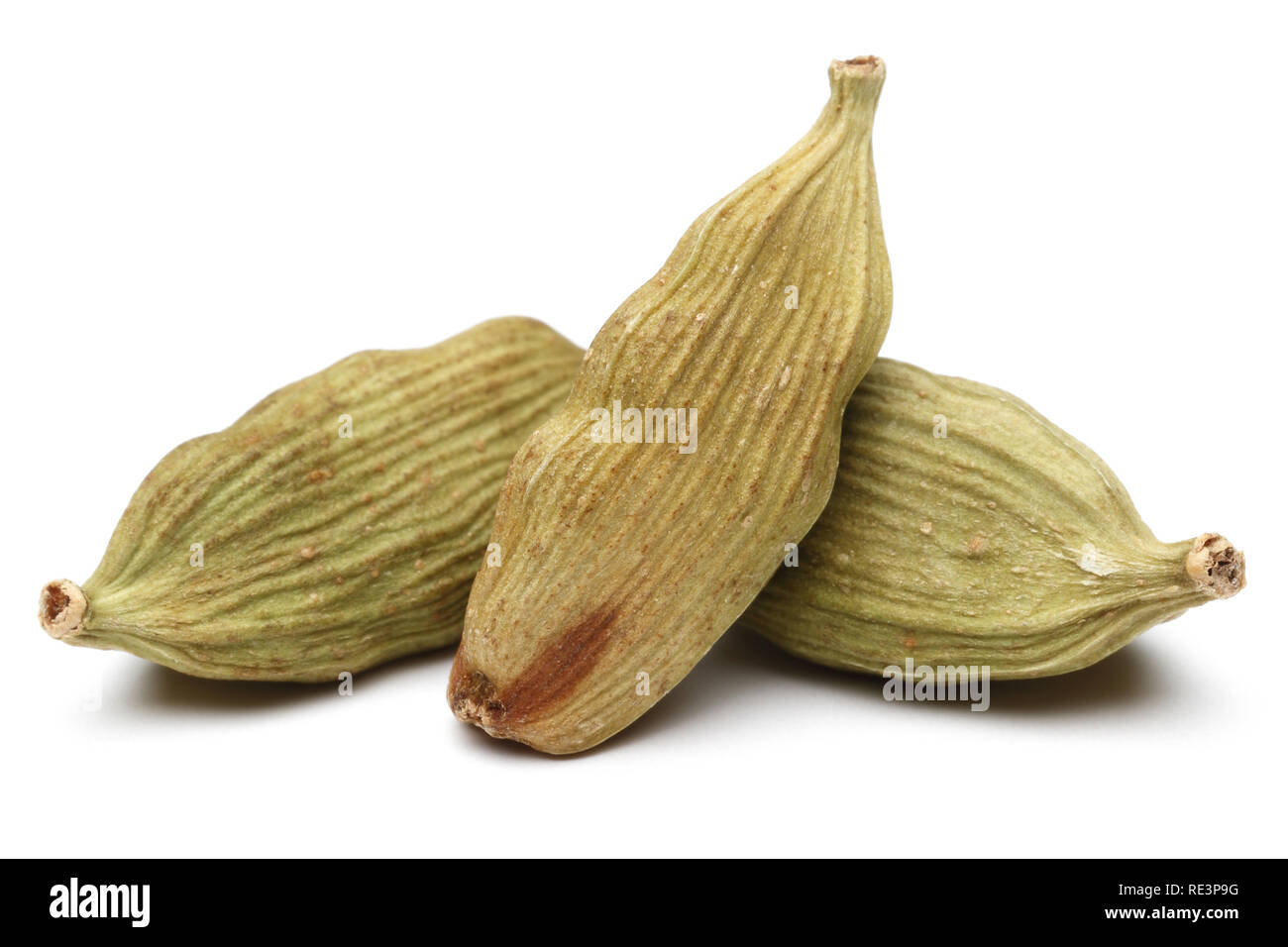 Dry cardamom pods isolated on white background Stock Photo - Alamy