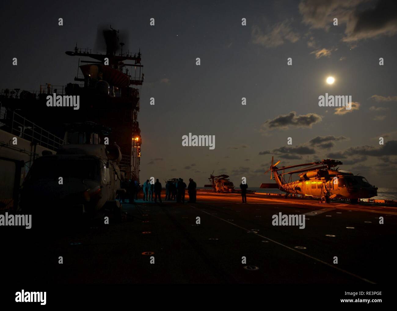 ATLANTIC OCEAN (Nov. 15, 2016) Sailors and Marines observe the ...