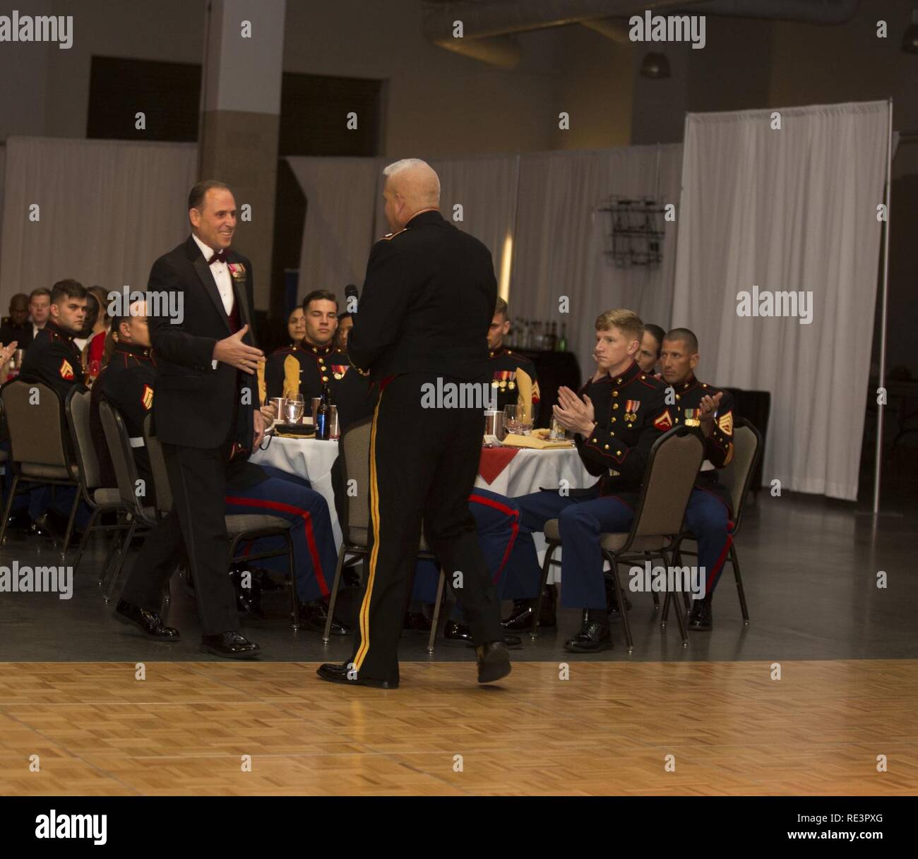 U.S. Marine Corps Lt. Col. John C. Golden, right, commanding officer ...