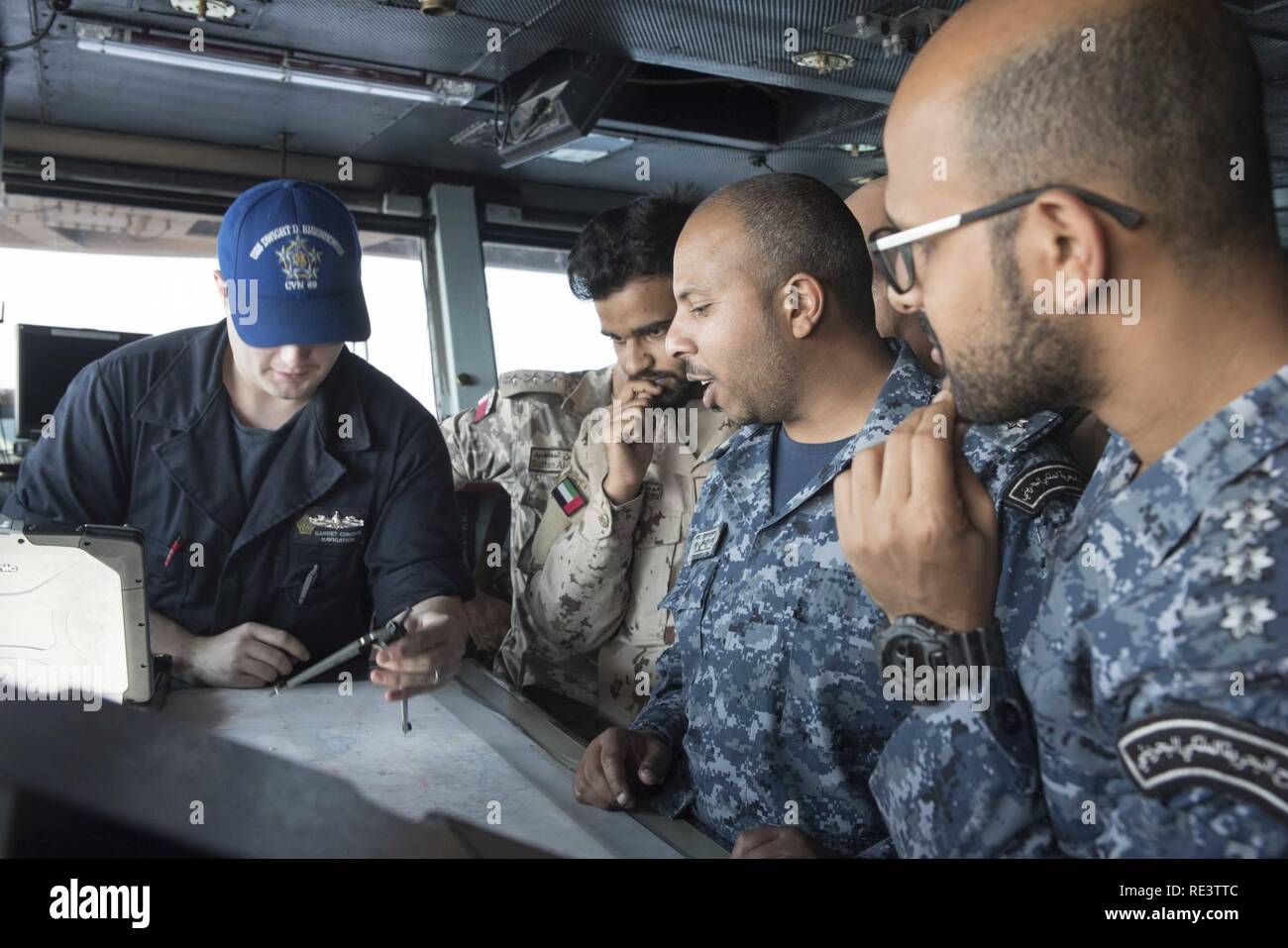 ARABIAN GULF (Nov. 14, 2016) Seaman Garret Cundiff, left, shows staff ...