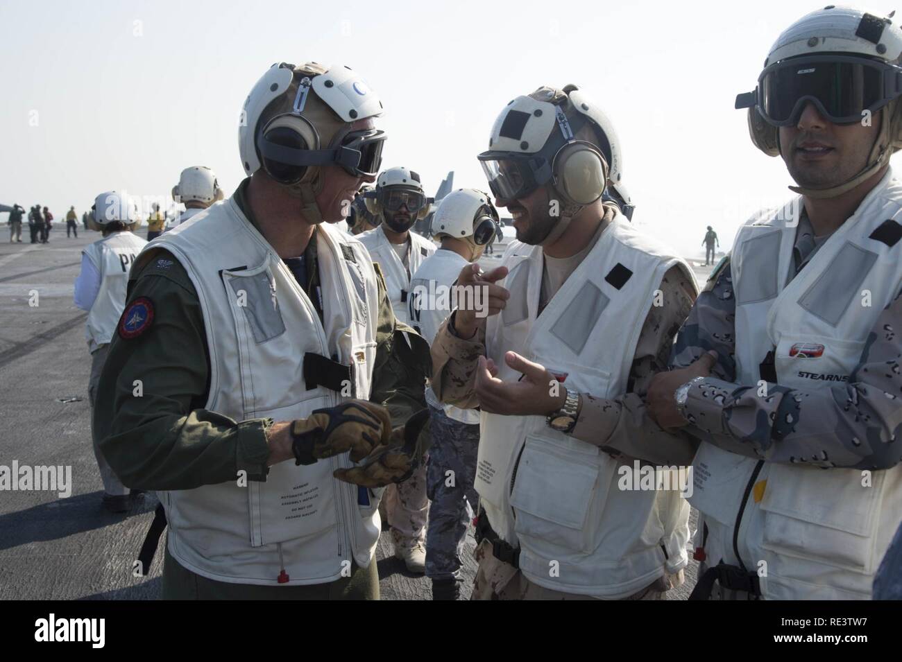 ARABIAN GULF (Nov. 14, 2016) Capt. Jeffrey T. Anderson, left, commander ...