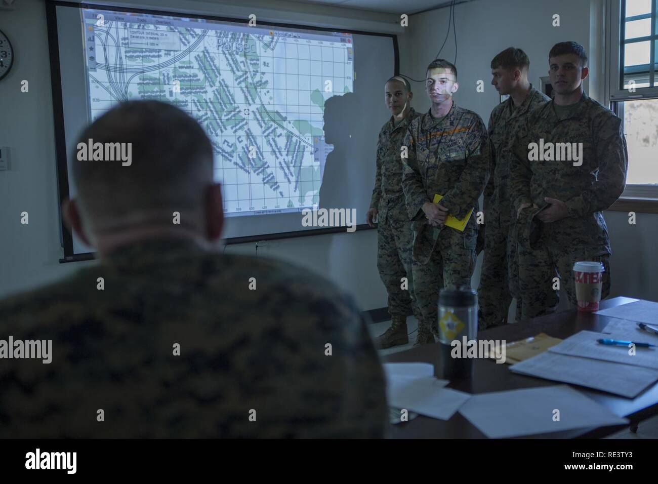 U.S. Marine Corps Lt. Col. Marcus J. Mainz, left, commanding officer ...