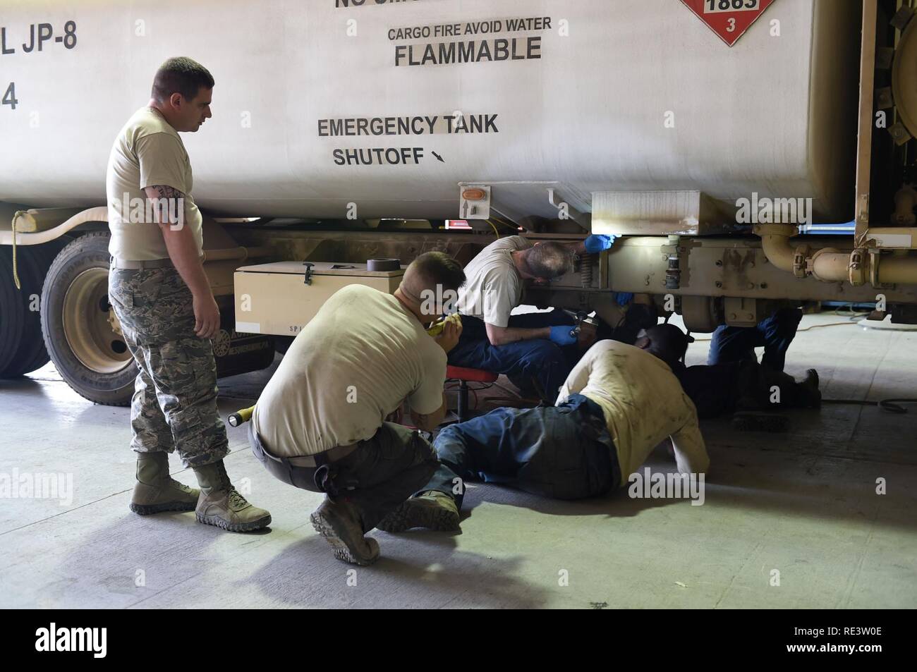 380th Fire and Refueler Maintenance members observe and advise Col ...