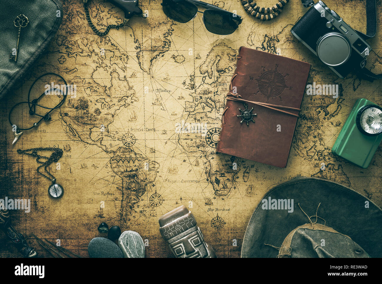 Old map, vintage travel equipment and souvenirs from the travel around ...
