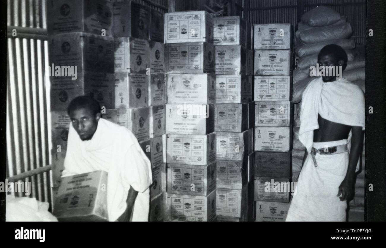 TWO MEN LOADING BOXES Stock Photo - Alamy