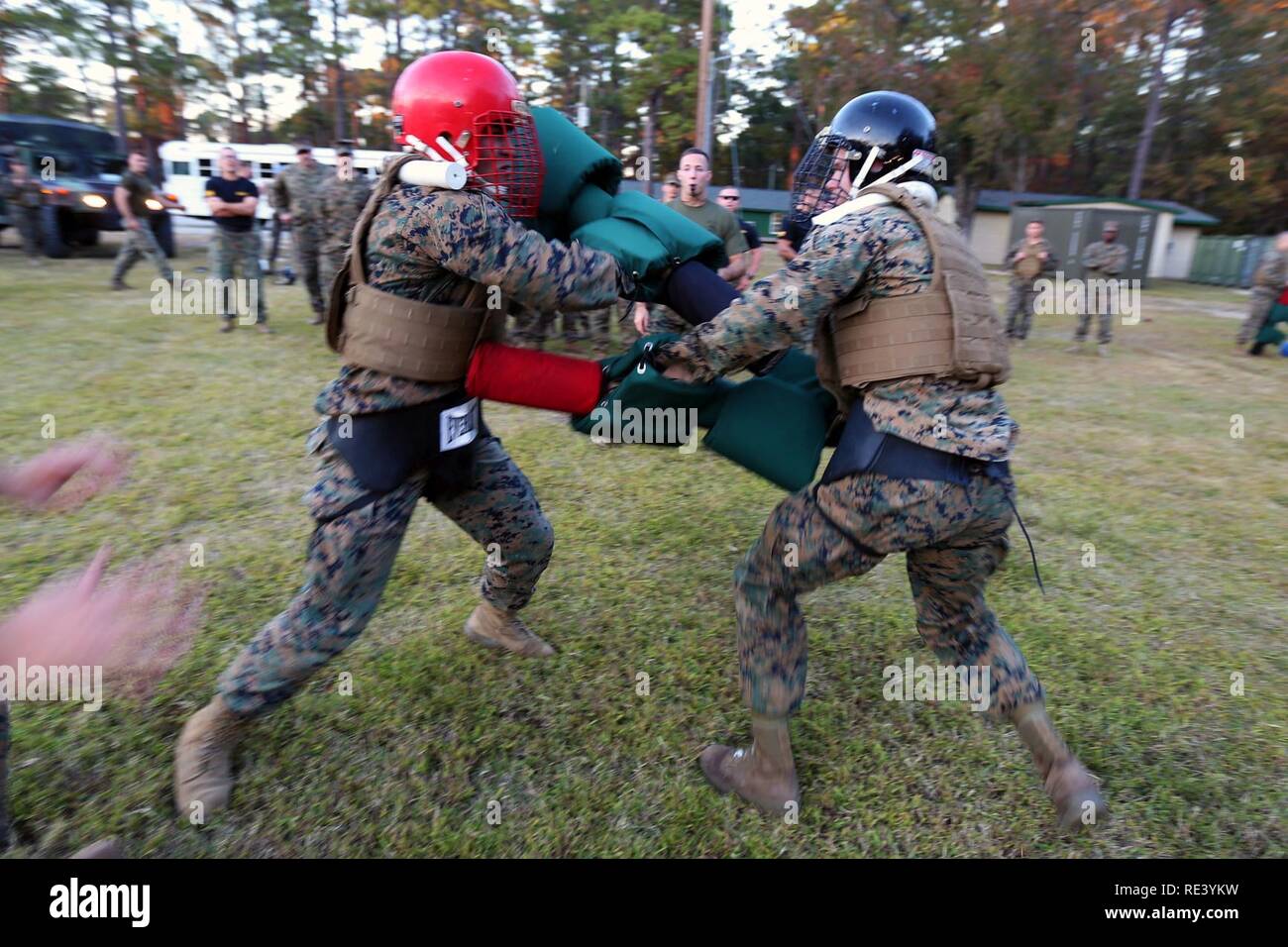 Seaman Jacob Whittaker (right) battles out against an opposing squad member during the pugil ...