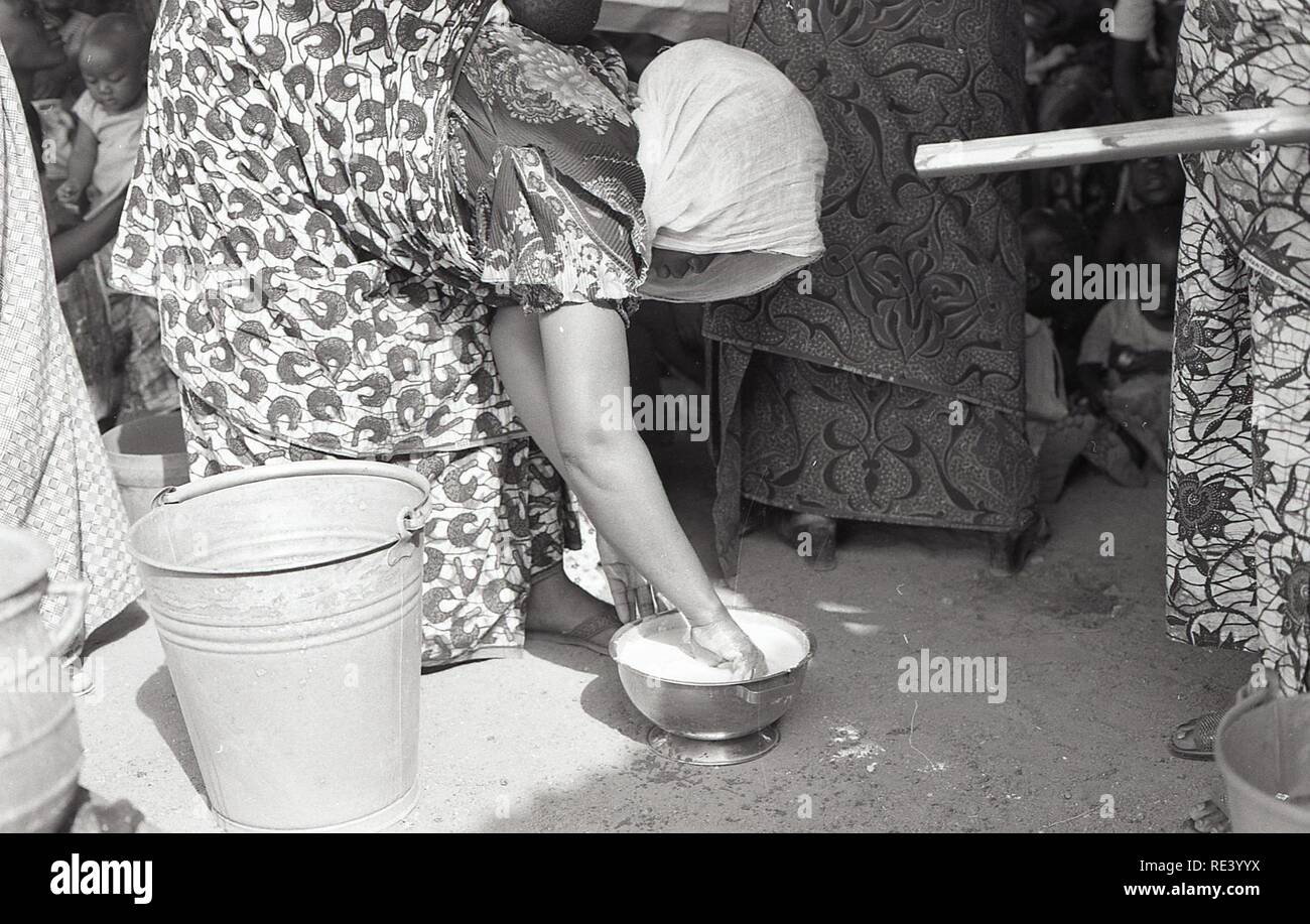 WOMAN MIXING PASTE IN BOWL Stock Photo - Alamy