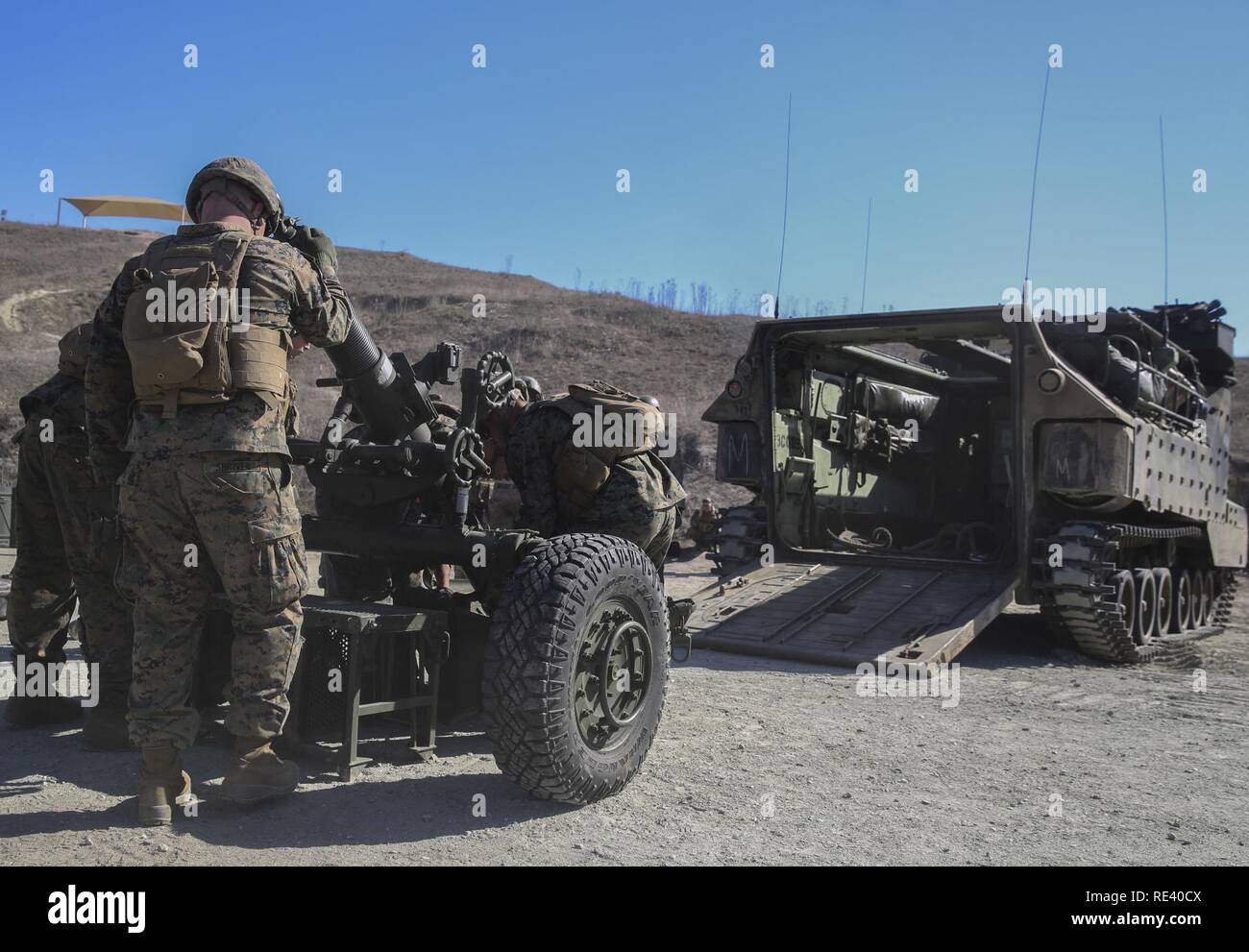 Marines with Battery B, 1st Battalion, 11th Marine Regiment, prepare an ...