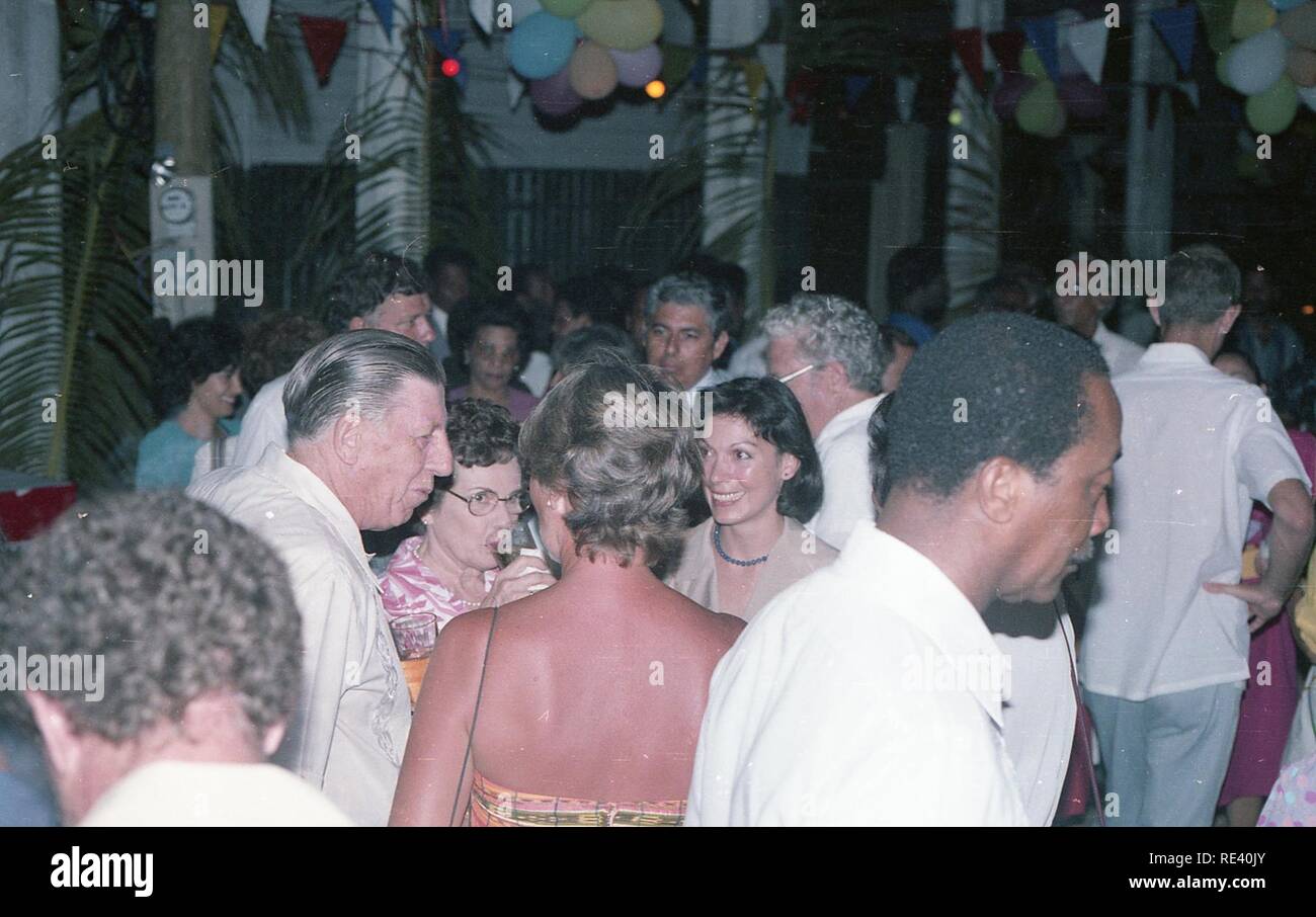 Group of people mingling together with one another hi-res stock ...