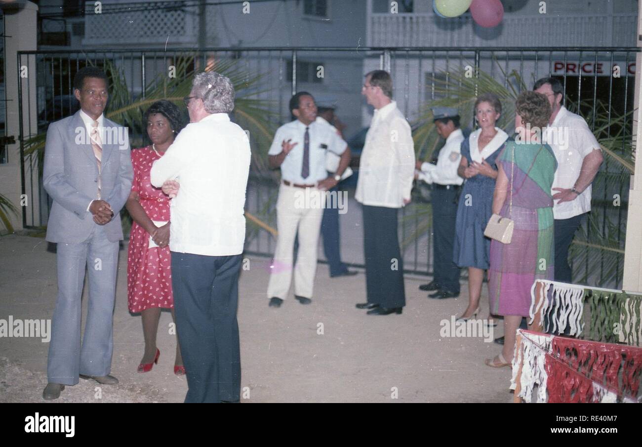 Group of people mingling together with one another hi-res stock ...
