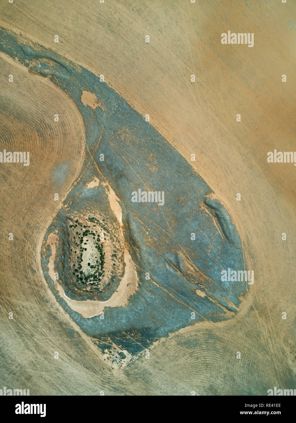 An earth dam sits empty after a prolonged drought near Mount Bryan East ...