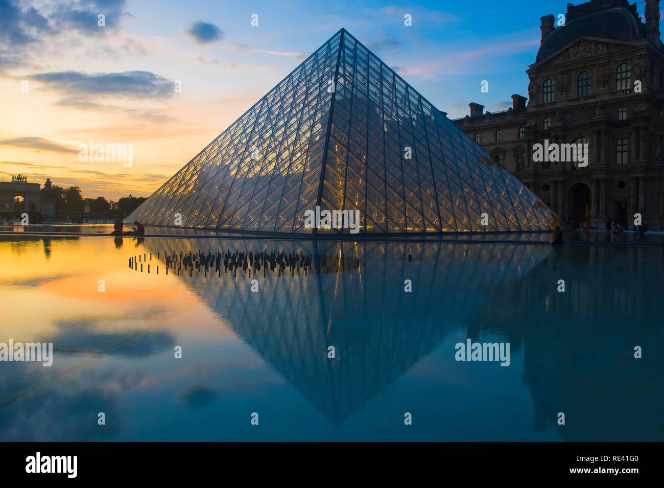 Louvre pyramid sunset hi-res stock photography and images - Alamy