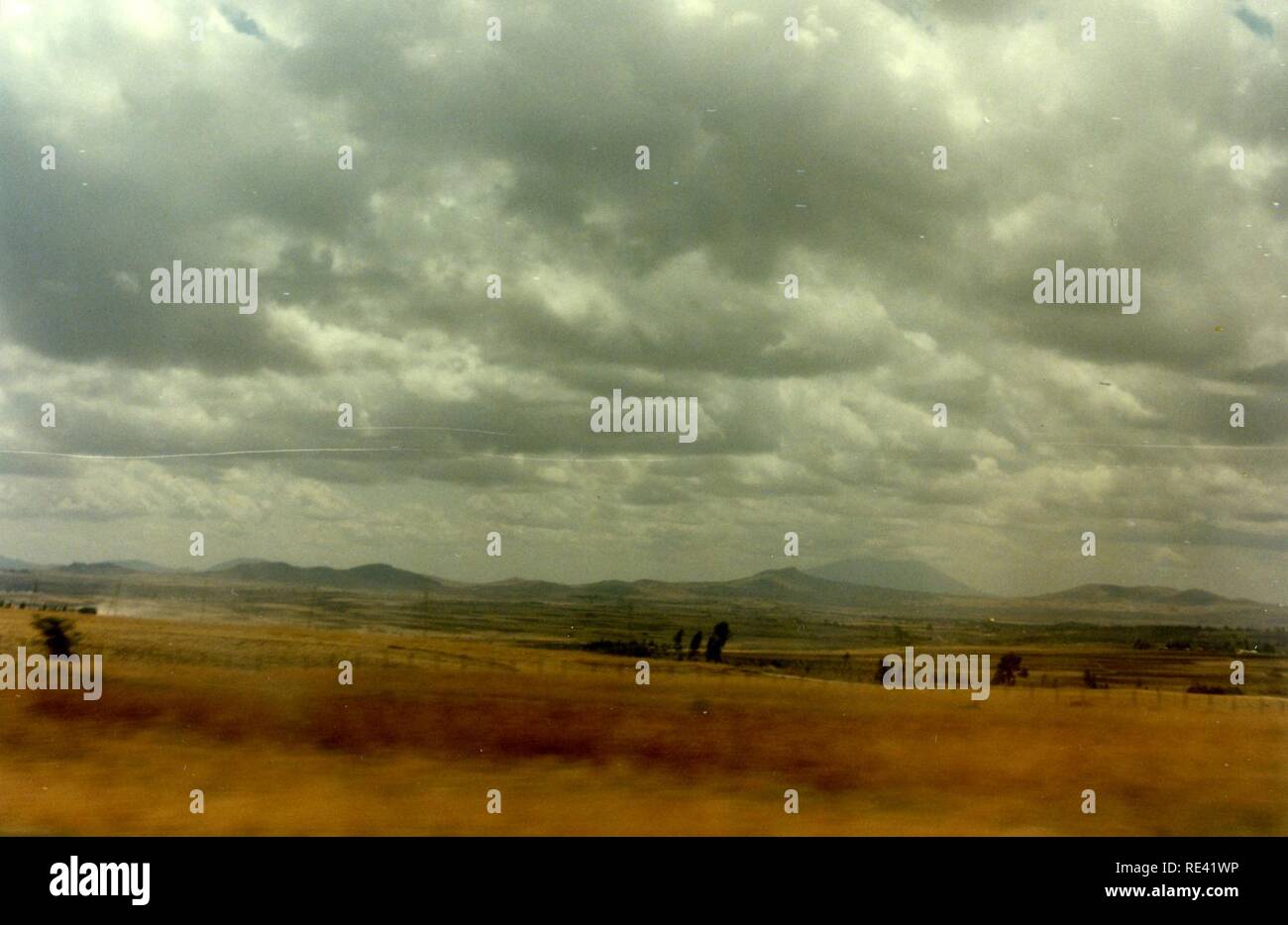 CLOUDY SKIES OVER A FARM AREA Stock Photo - Alamy